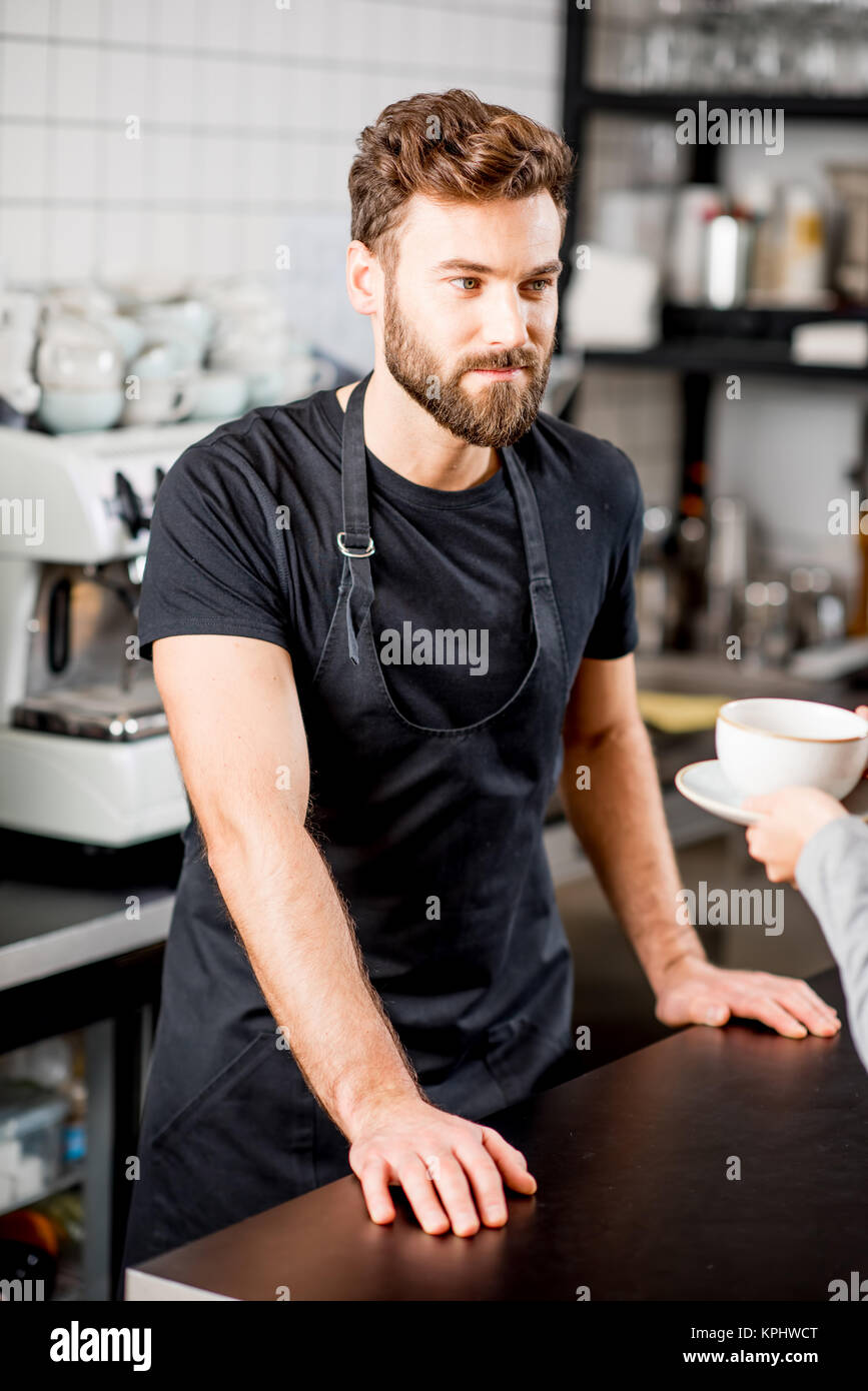 Barista portrait in the cafe Stock Photo - Alamy