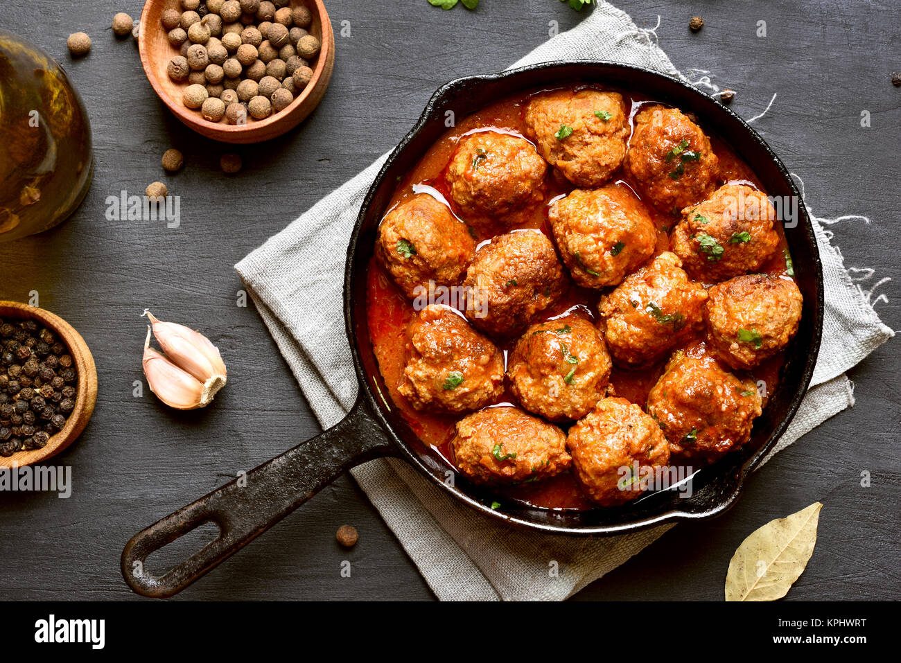 Meatballs with tomato sauce in cast iron pan. Top view, flat lay Stock ...