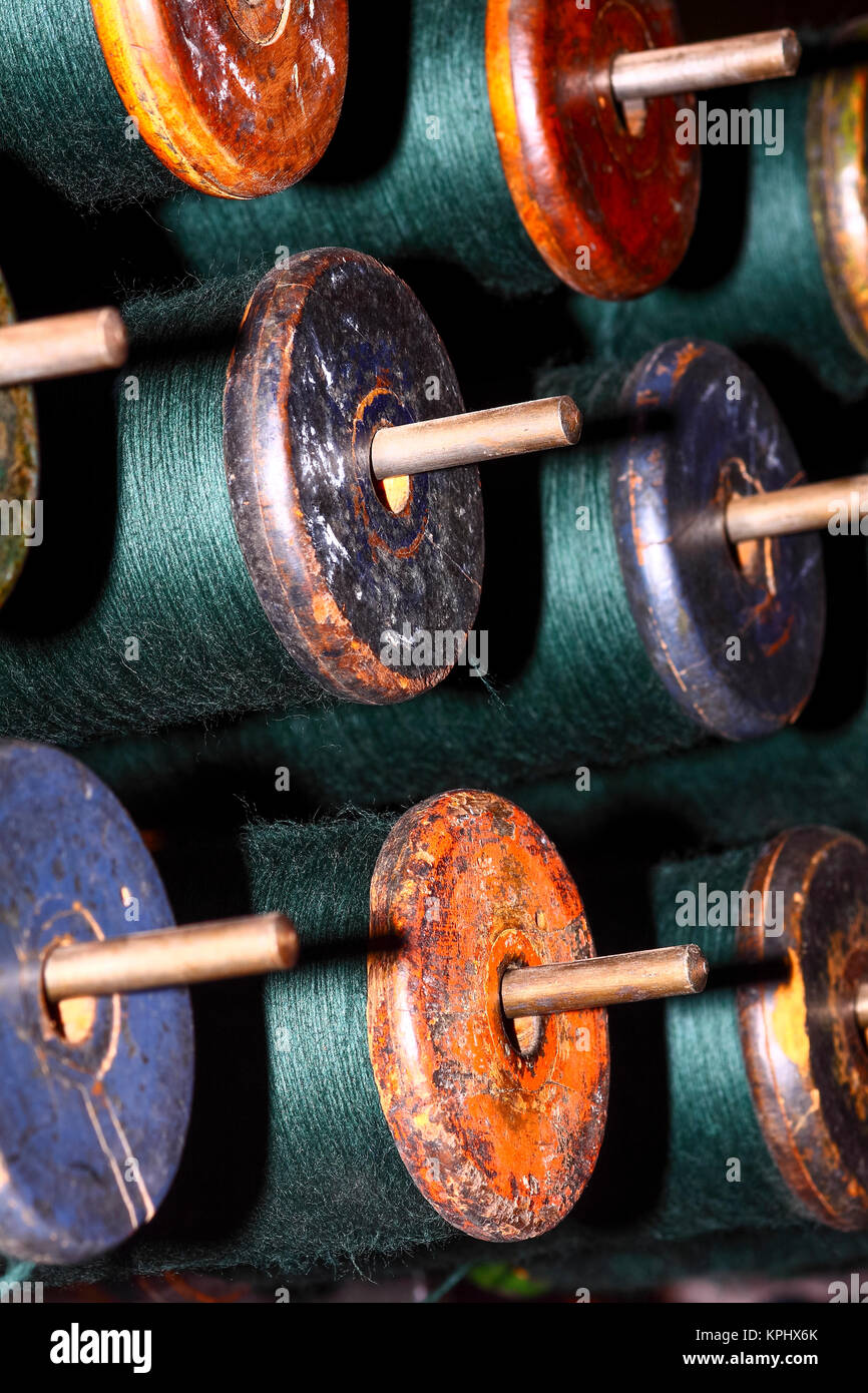 Close up green cotton bobbins loaded on to a weaving loom Stock Photo ...