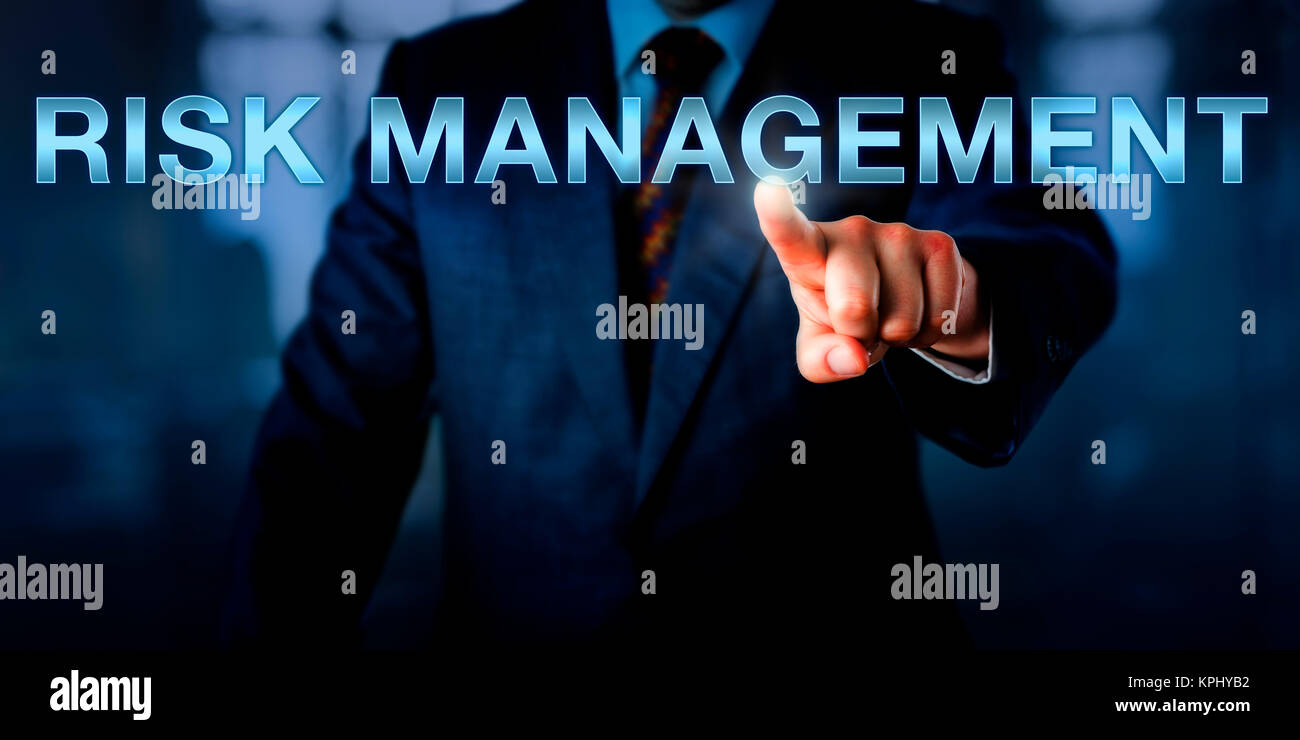 Corporate Executive Pressing RISK MANAGEMENT Stock Photo - Alamy