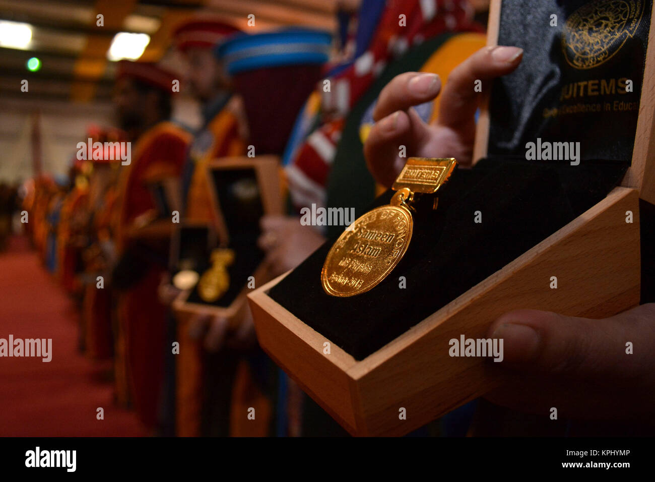 QUETTA, PAKISTAN. Dec-14 2017: A Pass Out student showing Badge of ...