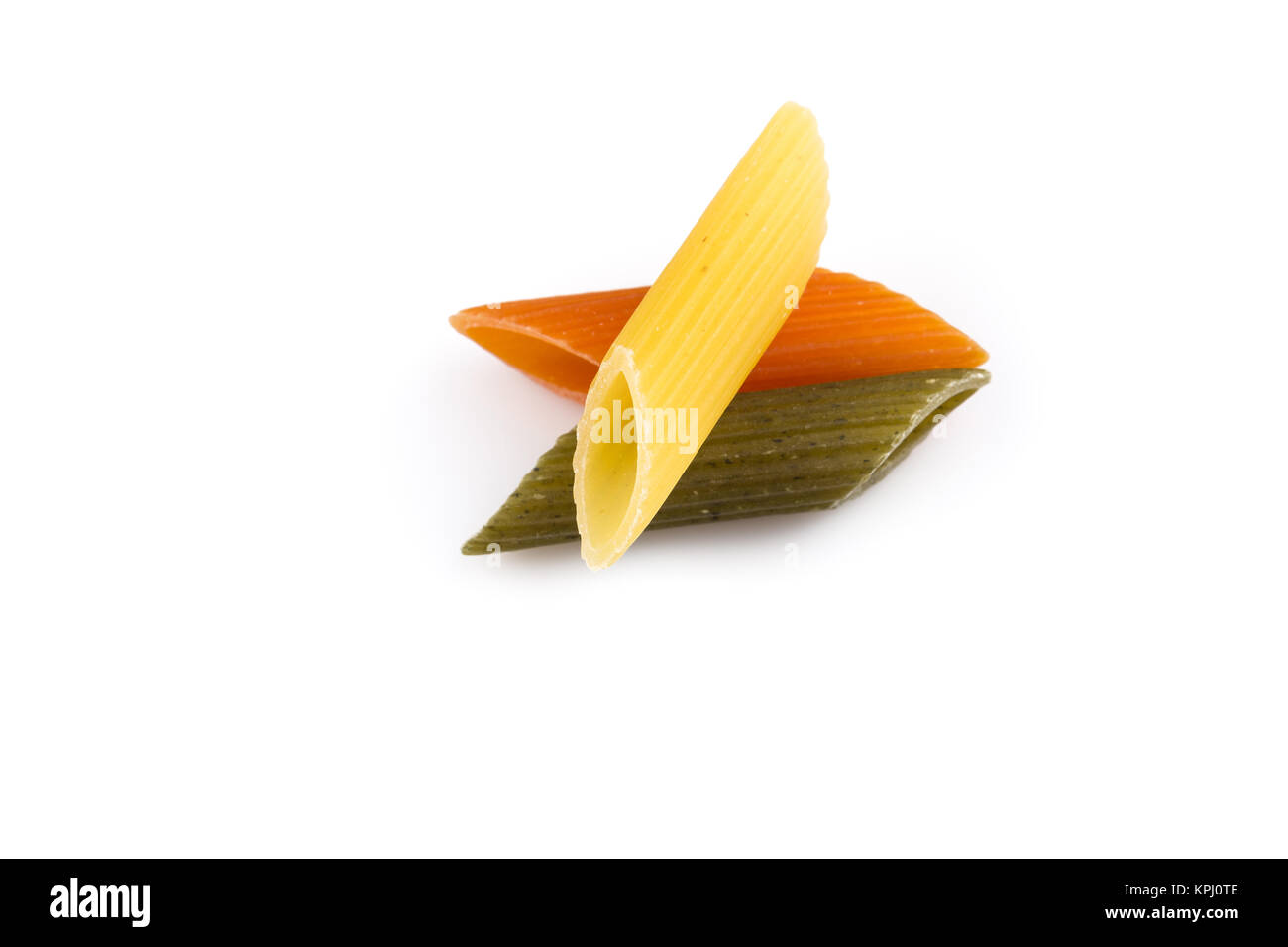 Raw colored pasta isolated on white background Stock Photo - Alamy