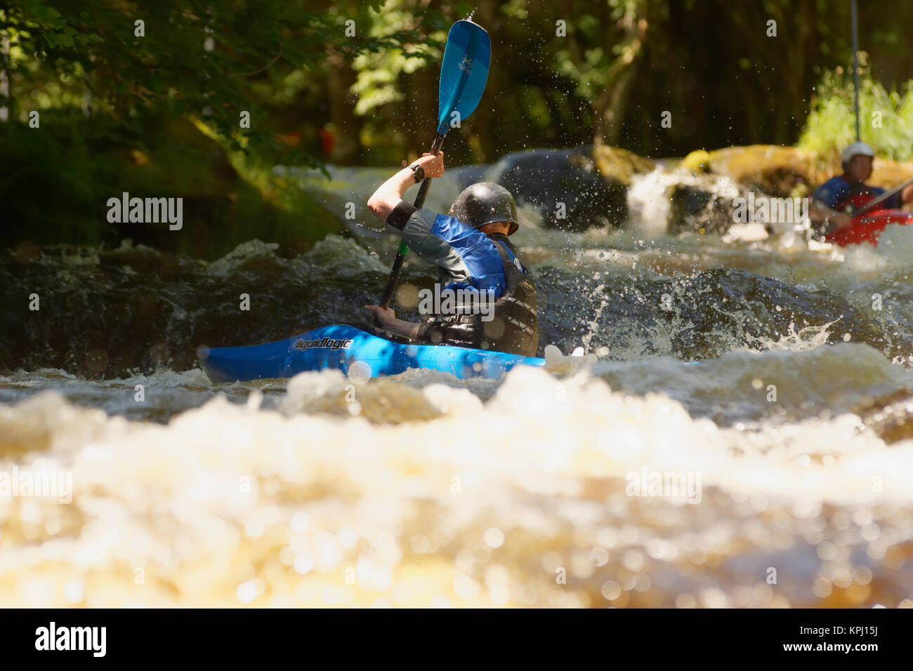 White water kayaker shooting the rapids at the National White Water ...