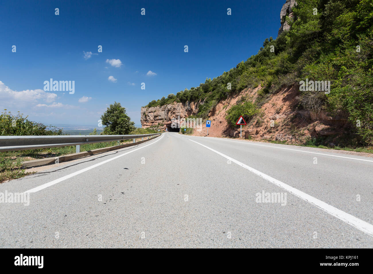 Rural road among rocks at summer Stock Photo - Alamy