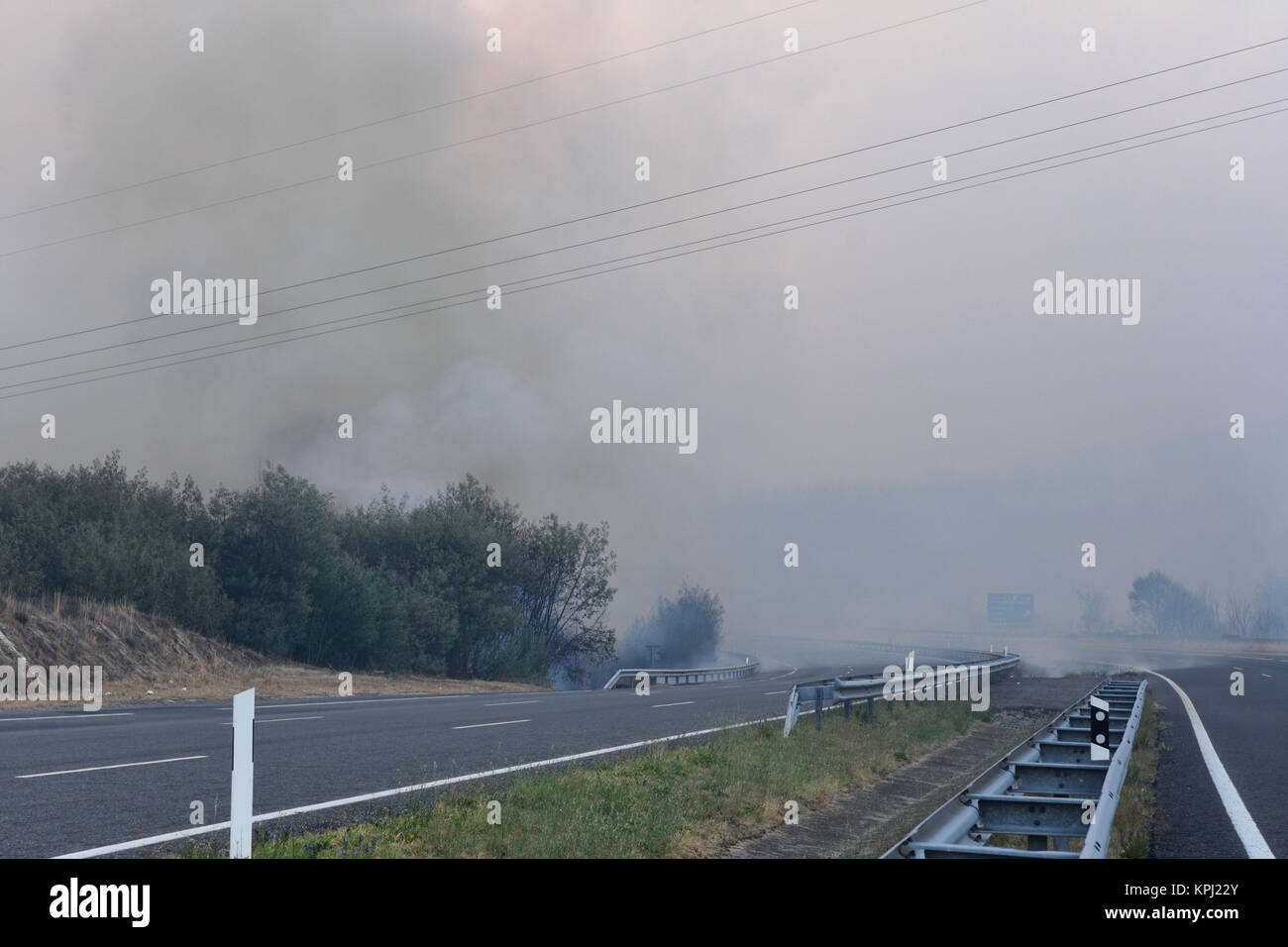 fire on the road Stock Photo - Alamy