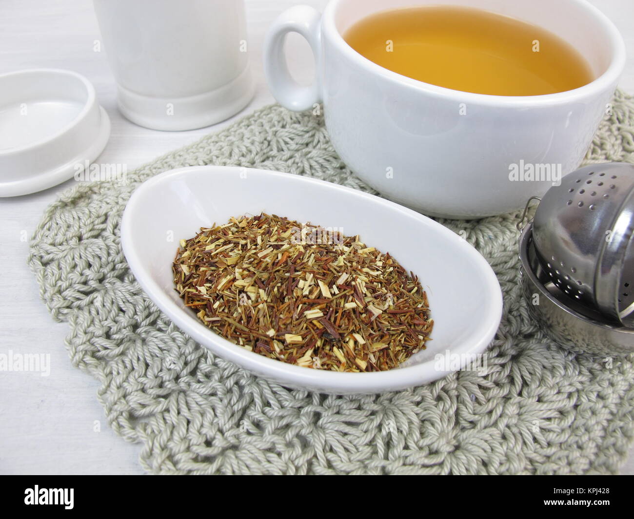 A cup of green red bush tea Stock Photo - Alamy