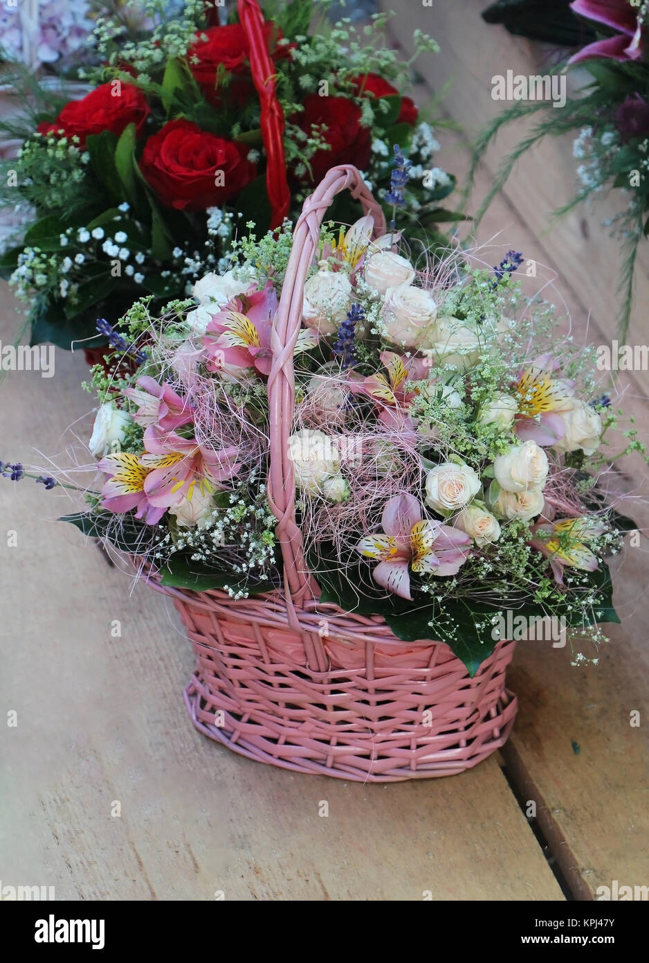 Pink flower basket Stock Photo - Alamy