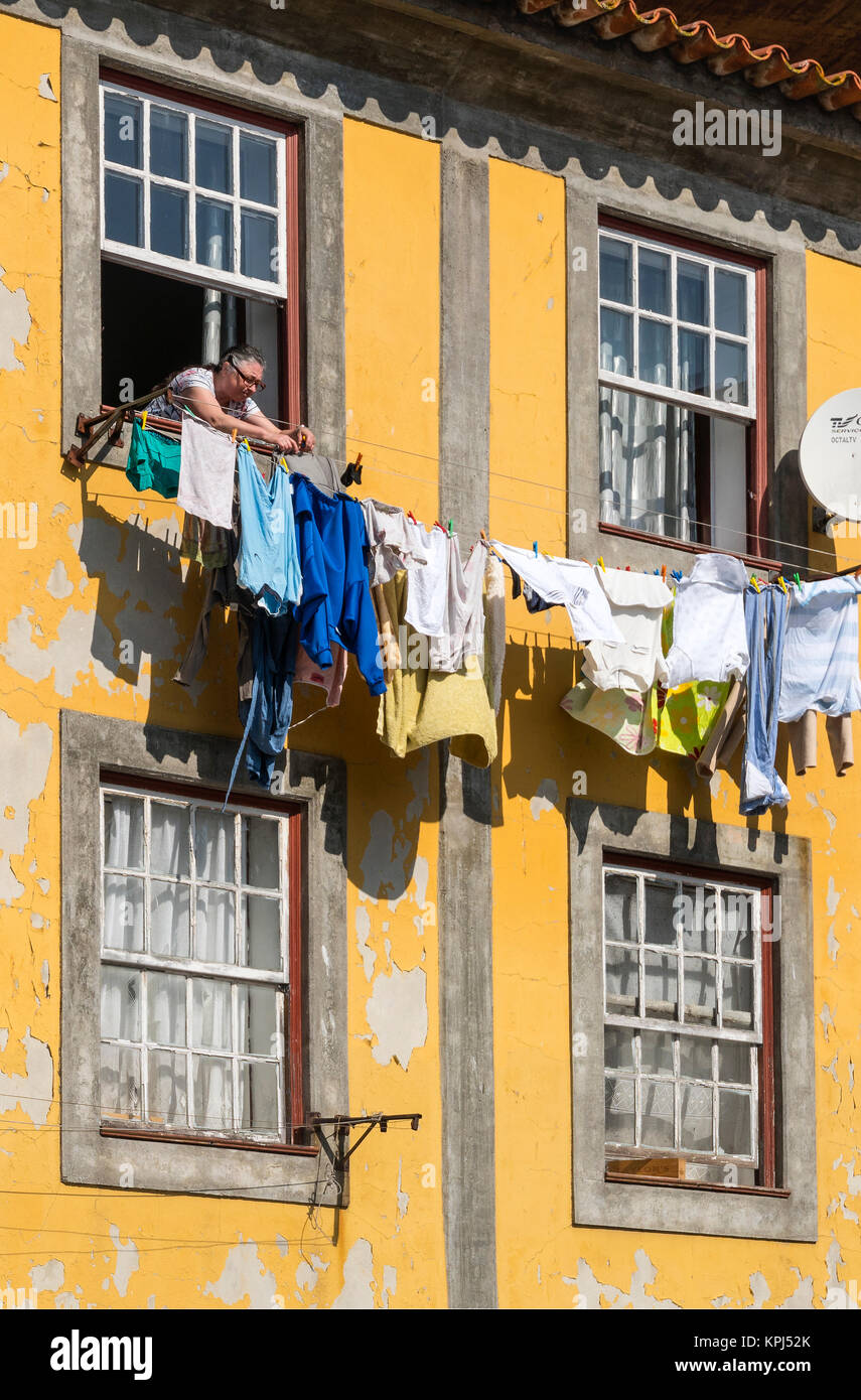 Hanging washing on the Cais da Ribeira, Porto's waterfront district by ...