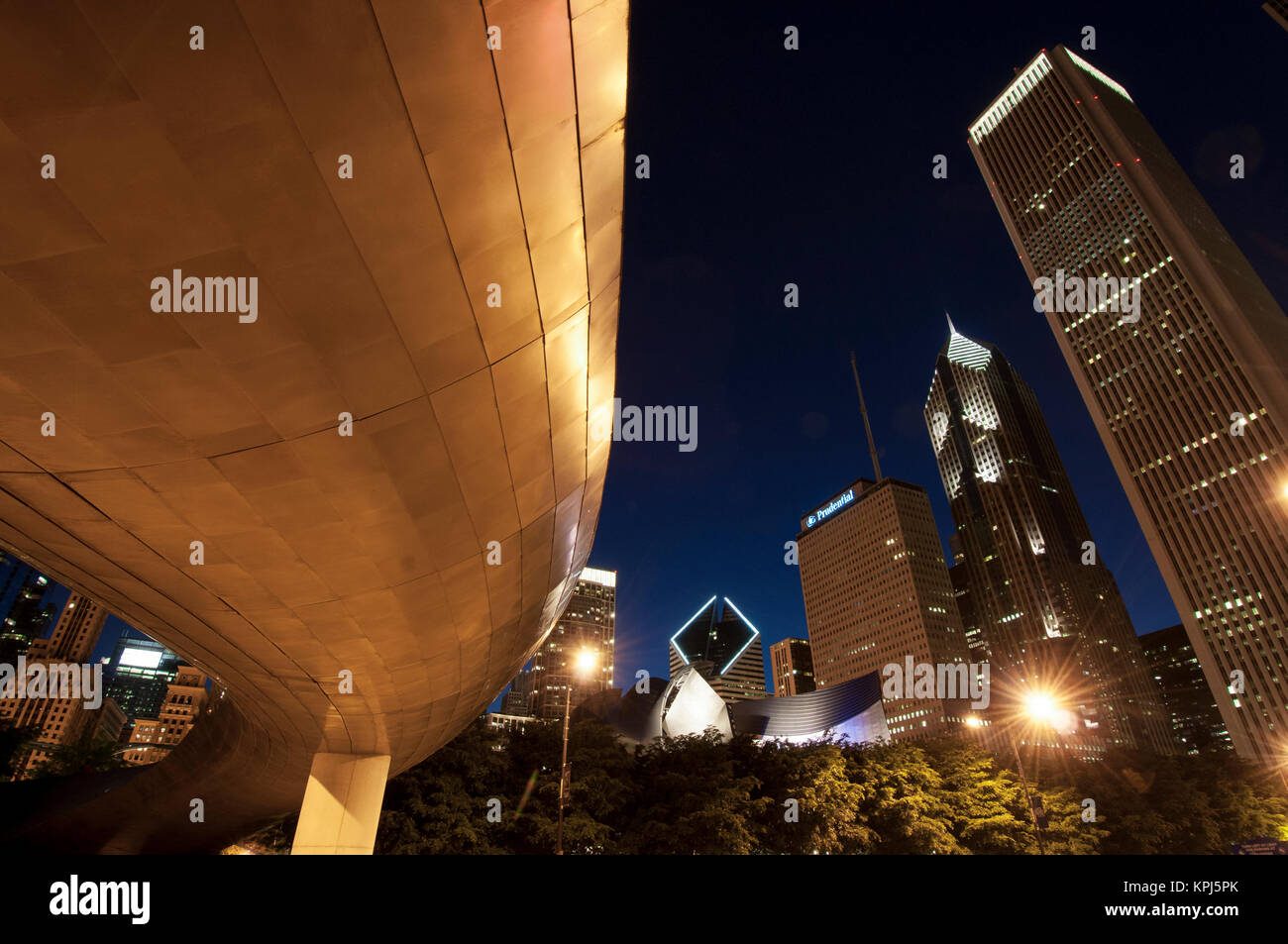 BP Bridge at Millennium Park and Chicago Skyline at dusk Stock Photo ...