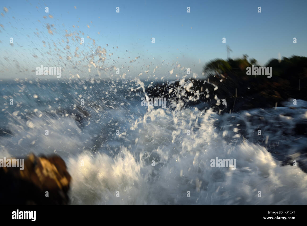 Sea wave splash Stock Photo - Alamy