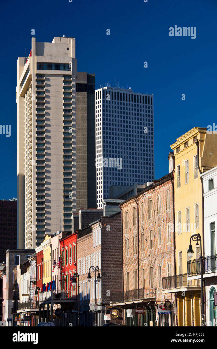 Buildings along Decatur Street in morning light, New Orleans, Louisiana ...