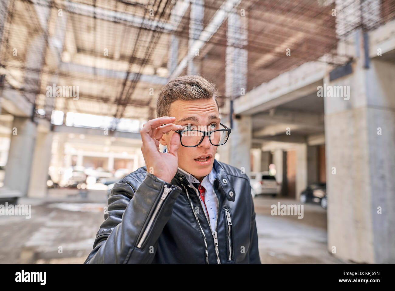 man gets out of the car Stock Photo - Alamy