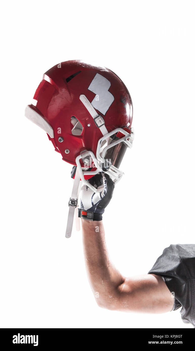 The hand of american football player with helmet on white background ...