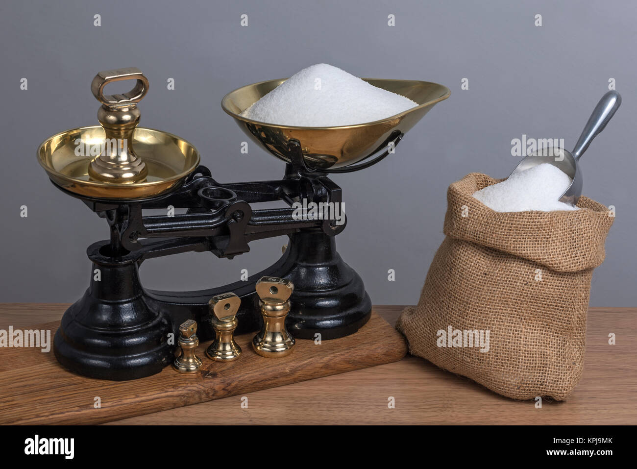 Sugar being weighed Stock Photo - Alamy