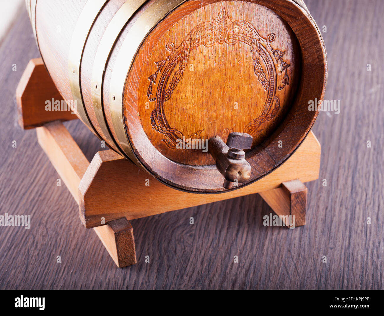 Small barrel over table Stock Photo - Alamy