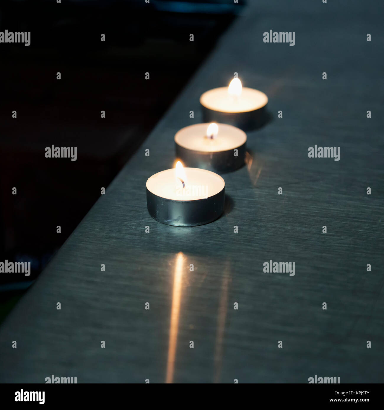 Candles over bar counter Stock Photo - Alamy