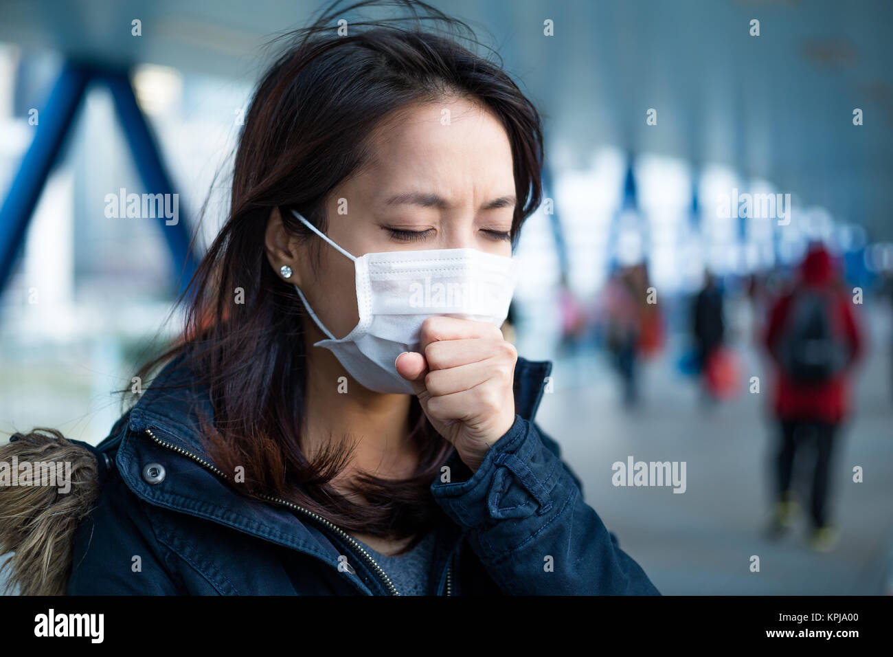 Asian Woman feeling unwell at outdoor Stock Photo - Alamy