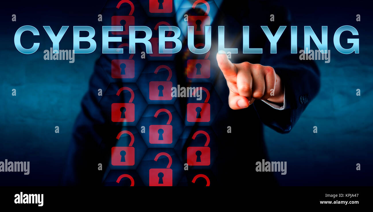 Anonymous Cyberbully Pressing CYBERBULLYING Stock Photo - Alamy
