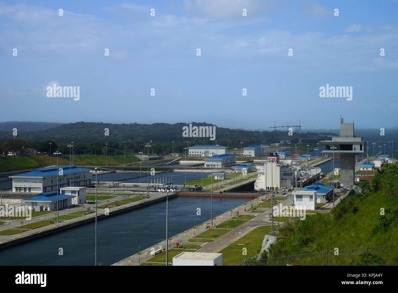 Agua Clara locks of Panama Canal, Panama with passing ship Stock Photo ...