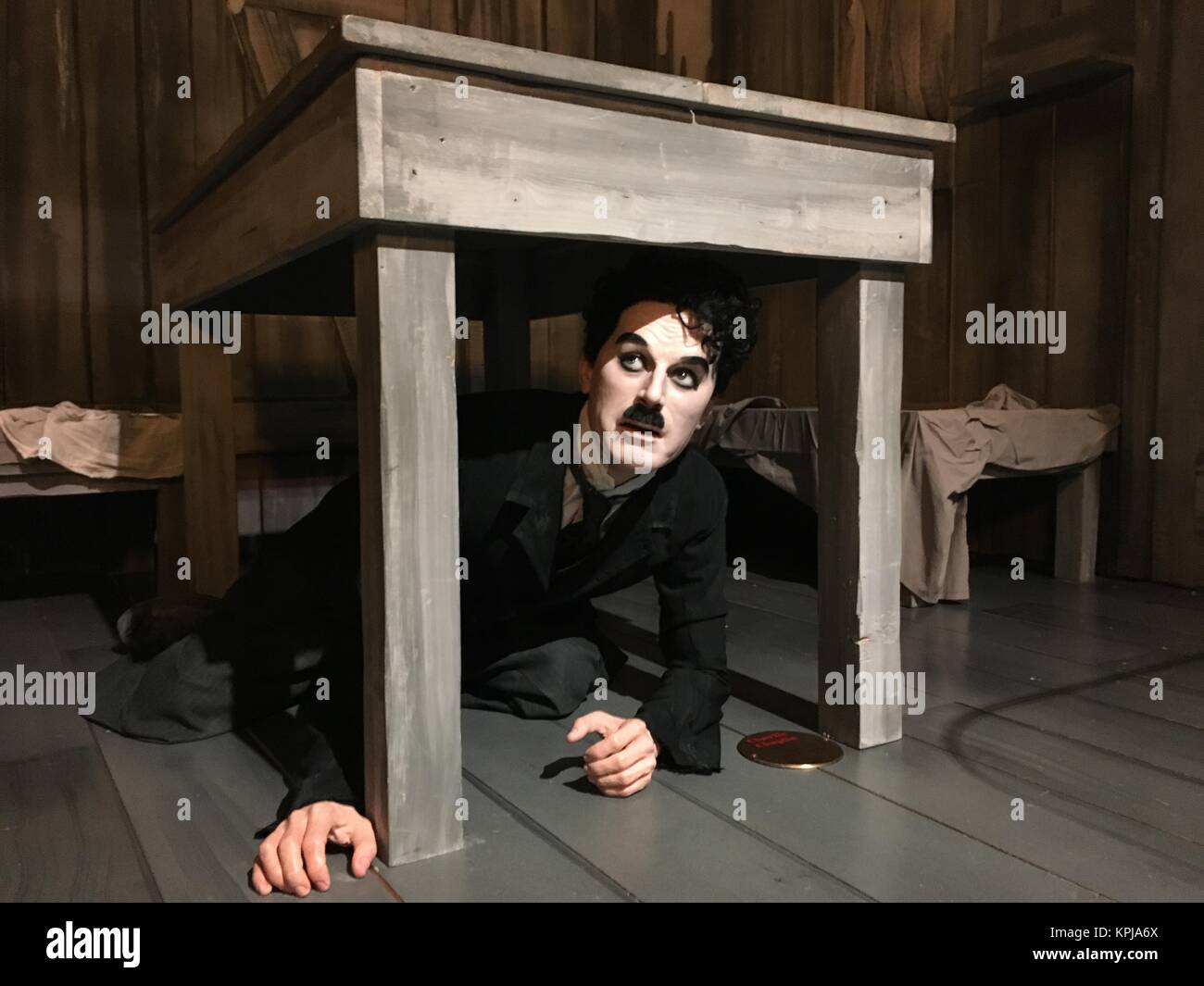 Picture of a reproduction in wax of a scene from one of Charlie Chaplin ...