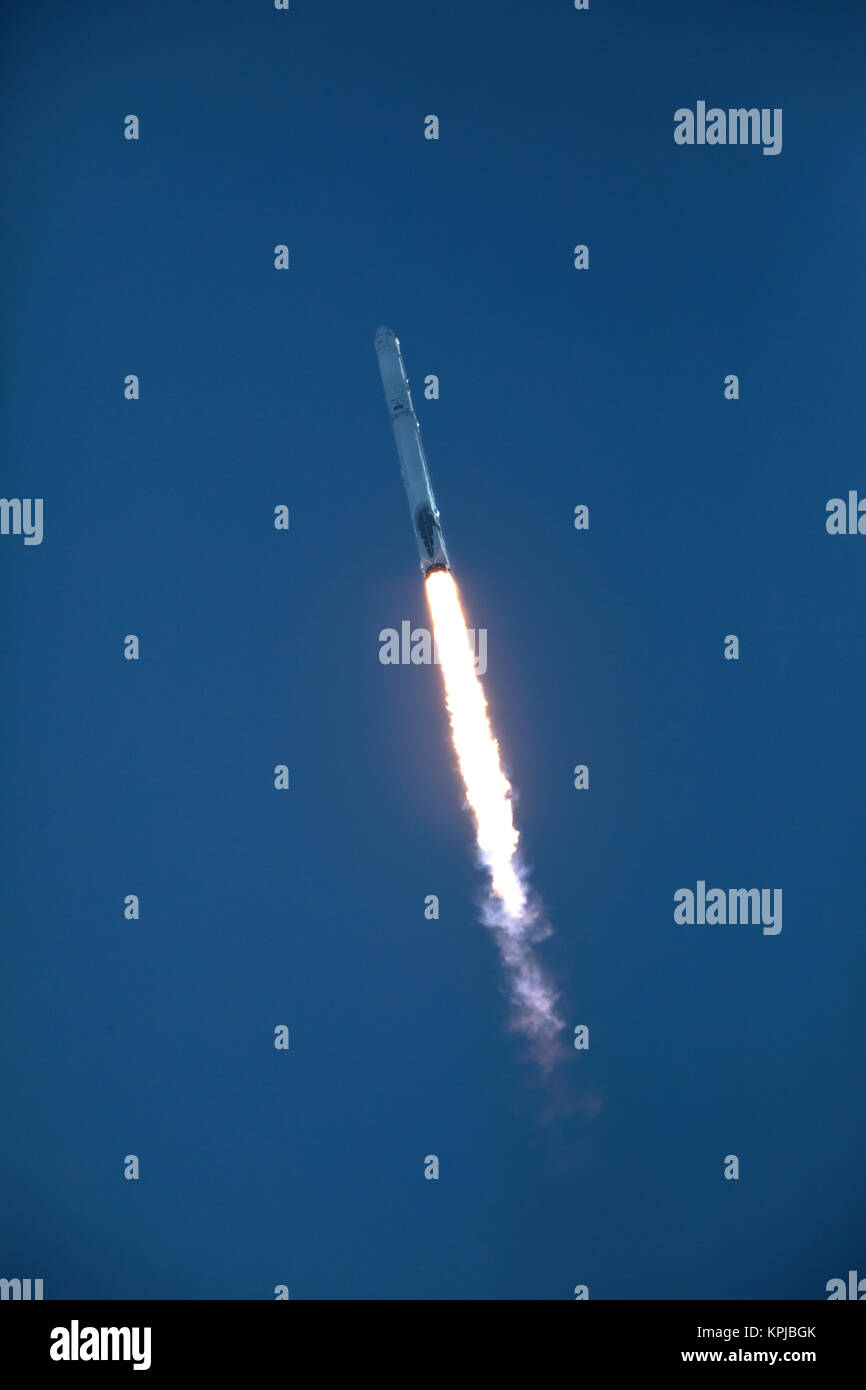 The SpaceX Falcon 9 rocket carrying the Dragon capsule blasts off from ...