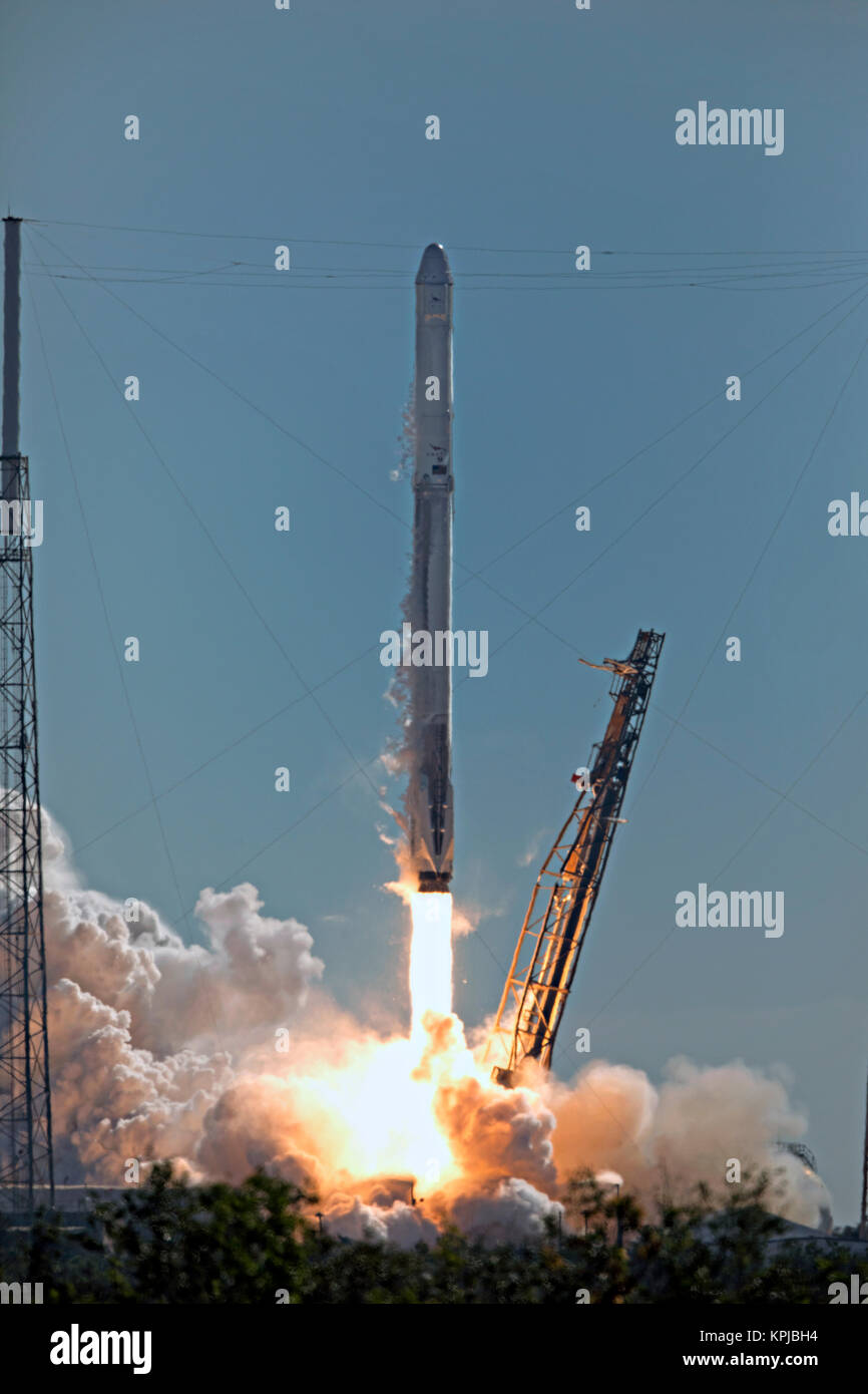 The SpaceX Falcon 9 rocket carrying the Dragon capsule blasts off from ...