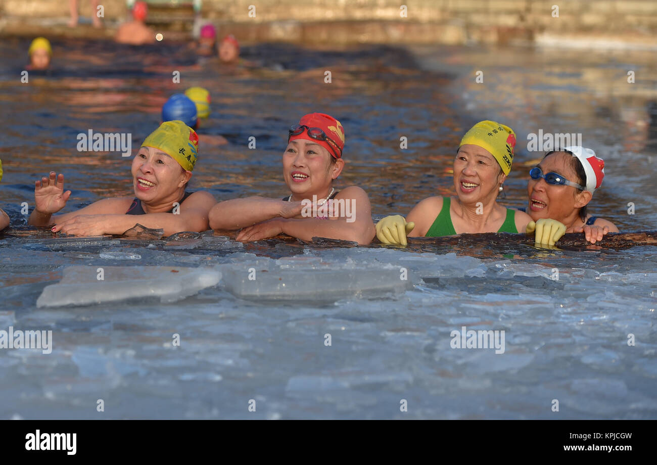 Shenyang, Shenyang, China. 15th Dec, 2017. Women gather at the Beiling Park for winter swimming ...