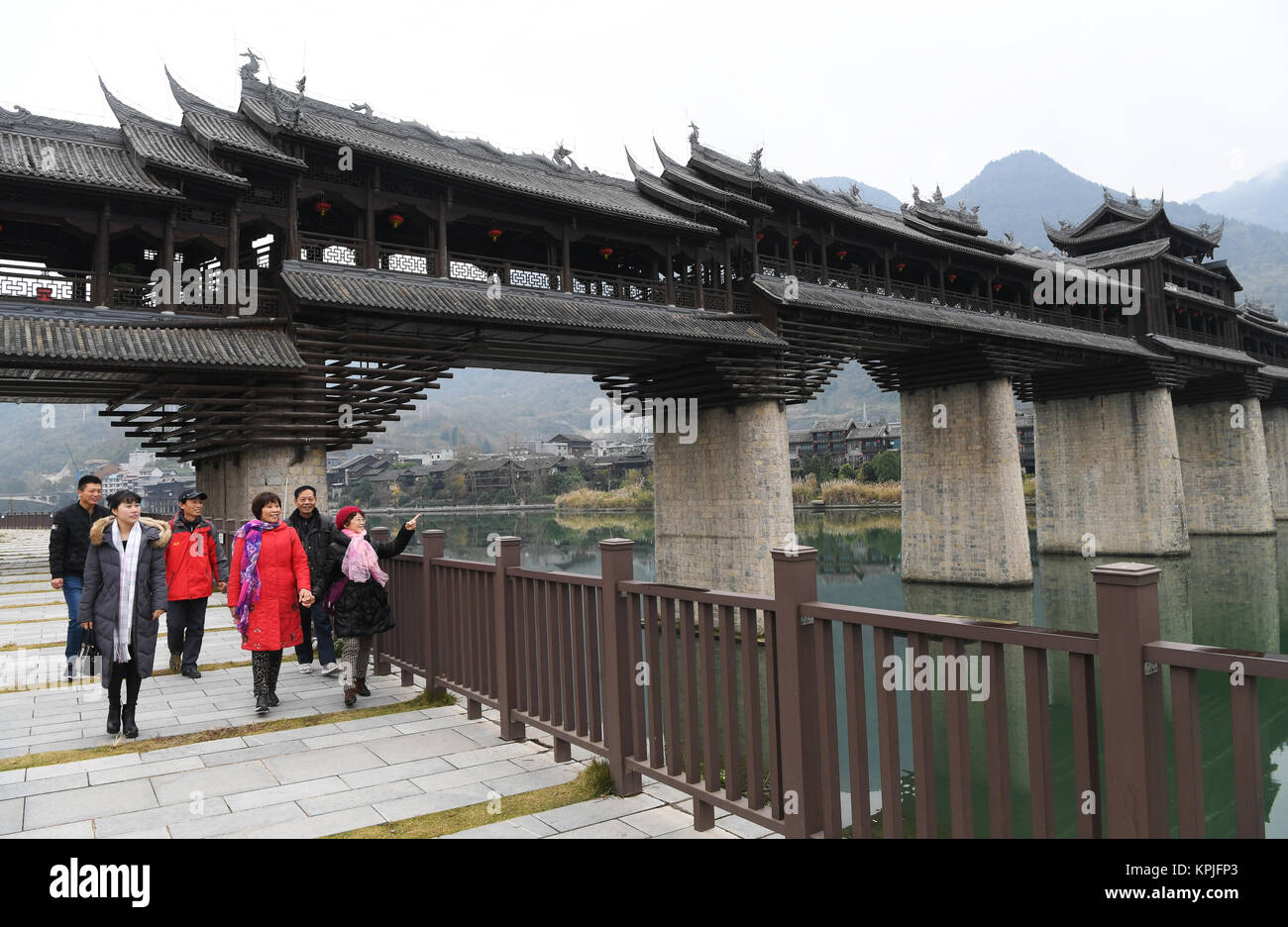 Qianjiang. 16th Dec, 2017. Tourists visit the Zhuoshui Ancient Town in ...