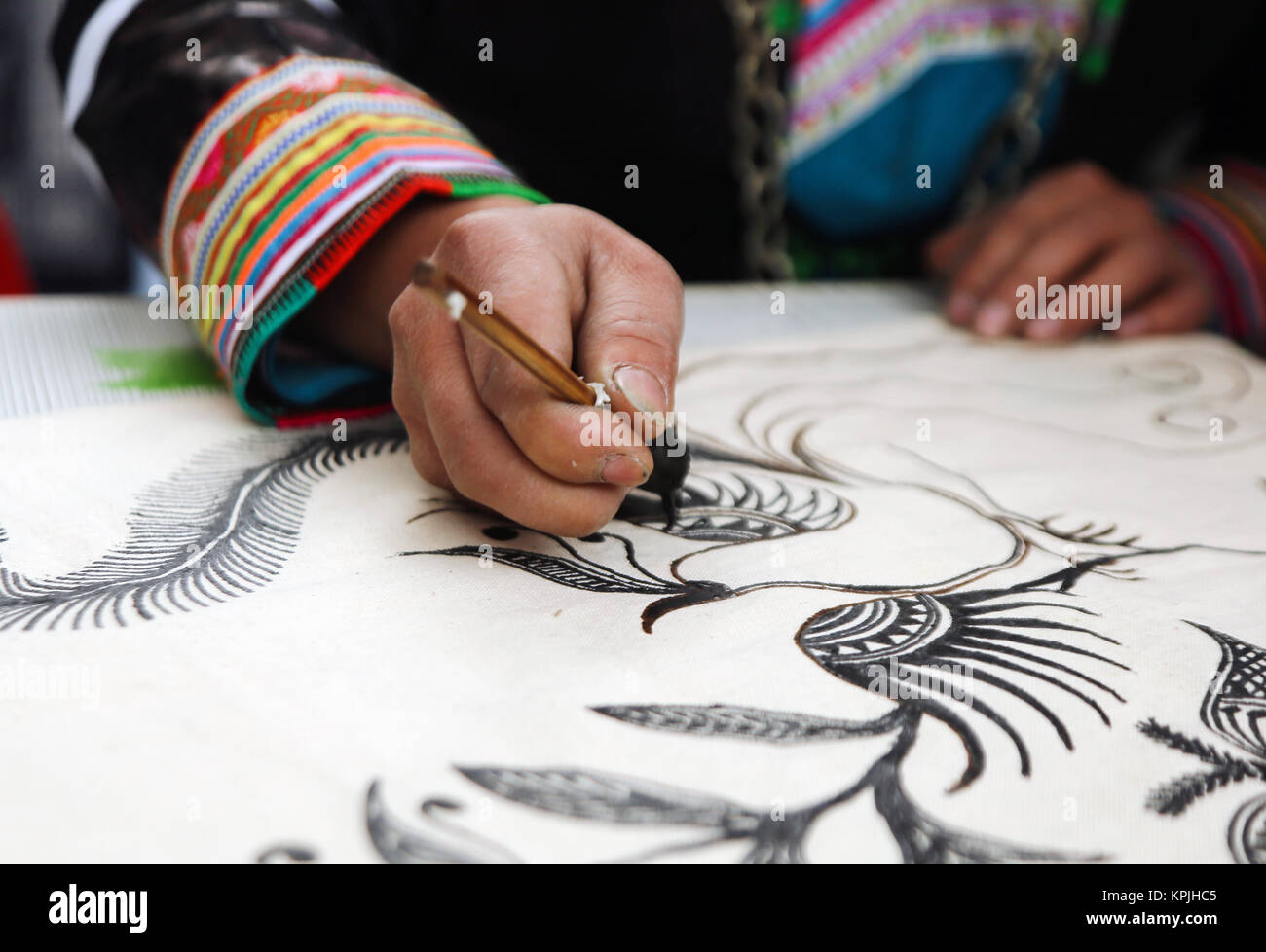 Rongjiang, China's Guizhou Province. 16th Dec, 2017. A villager makes a ...