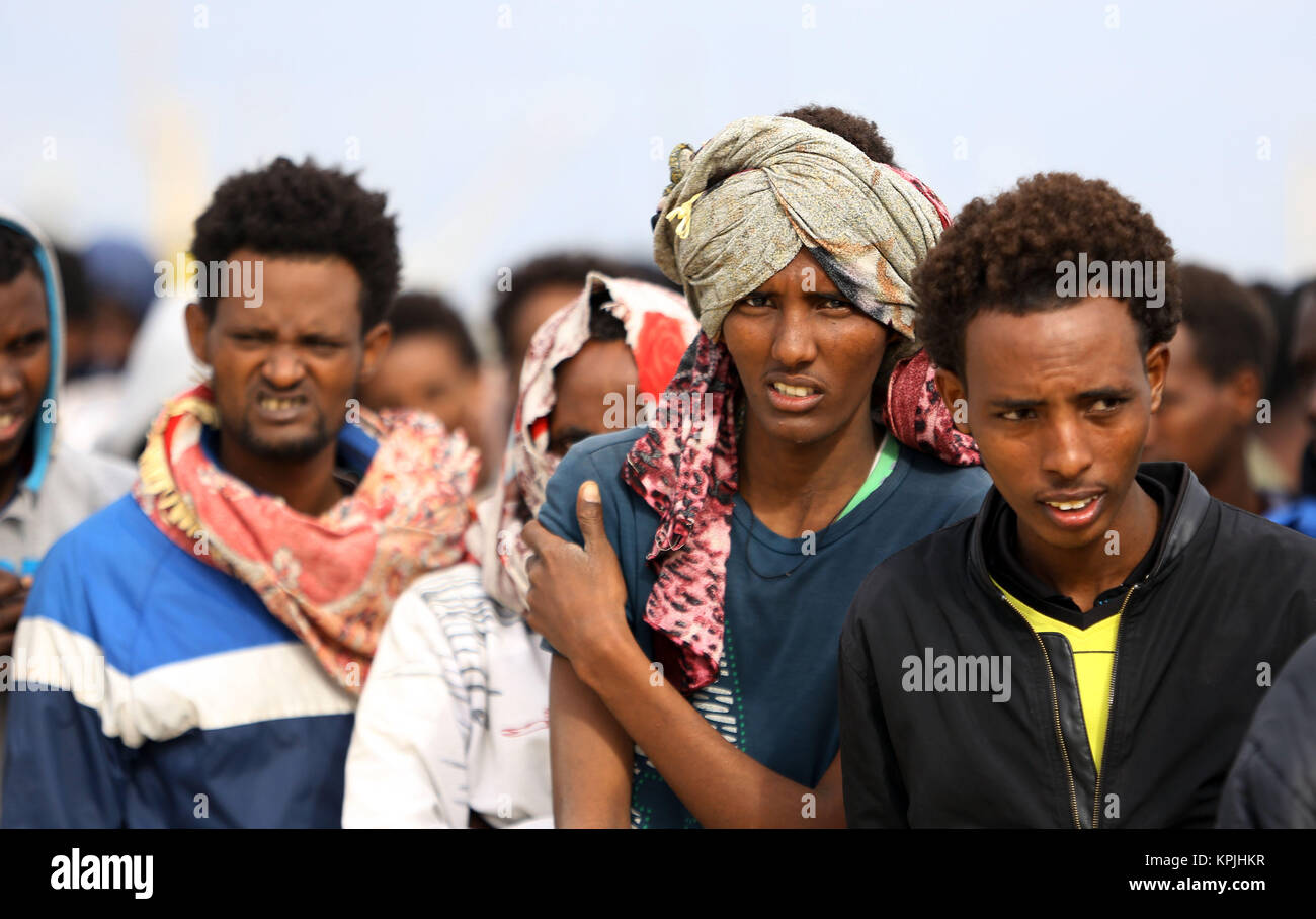 Tripoli. 16th Dec, 2017. Illegal immigrants arrive at a naval base in ...