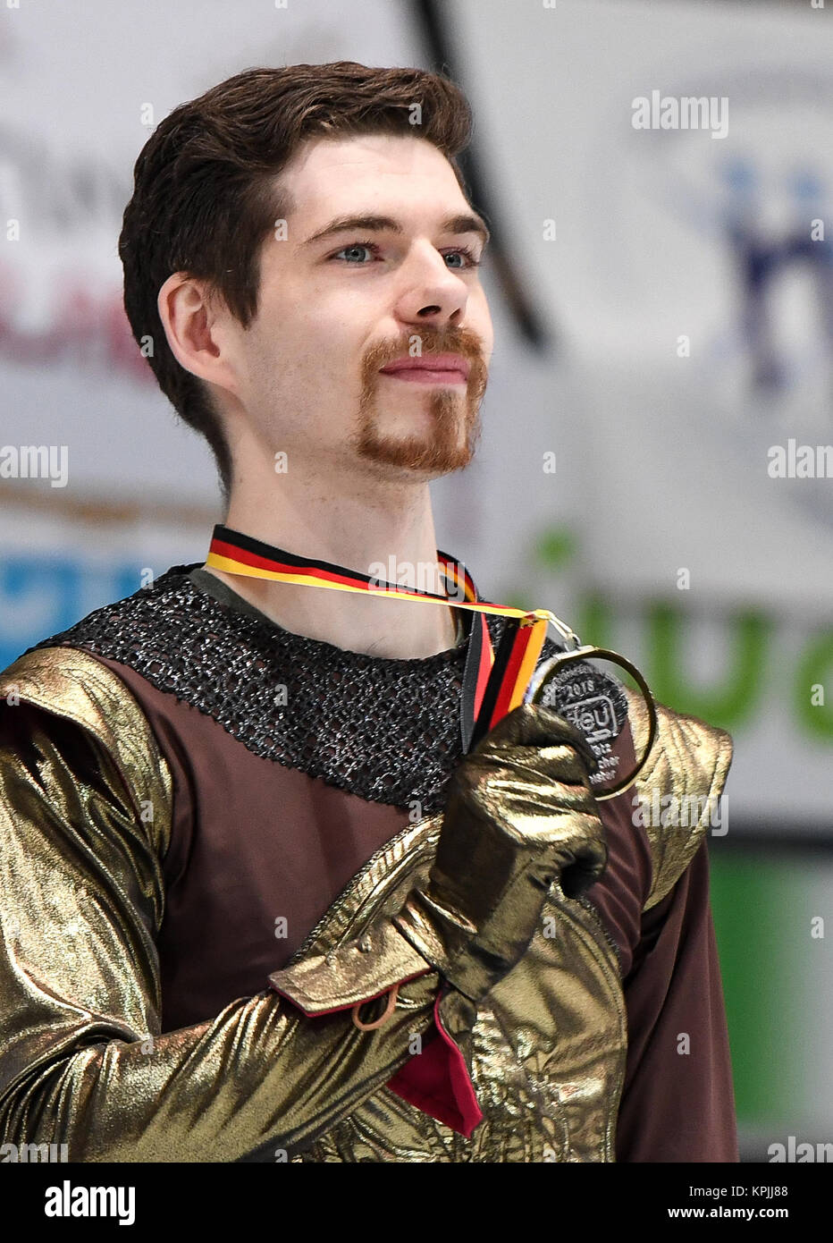 The new German Champion Paul Fentz with his medal during the award ...
