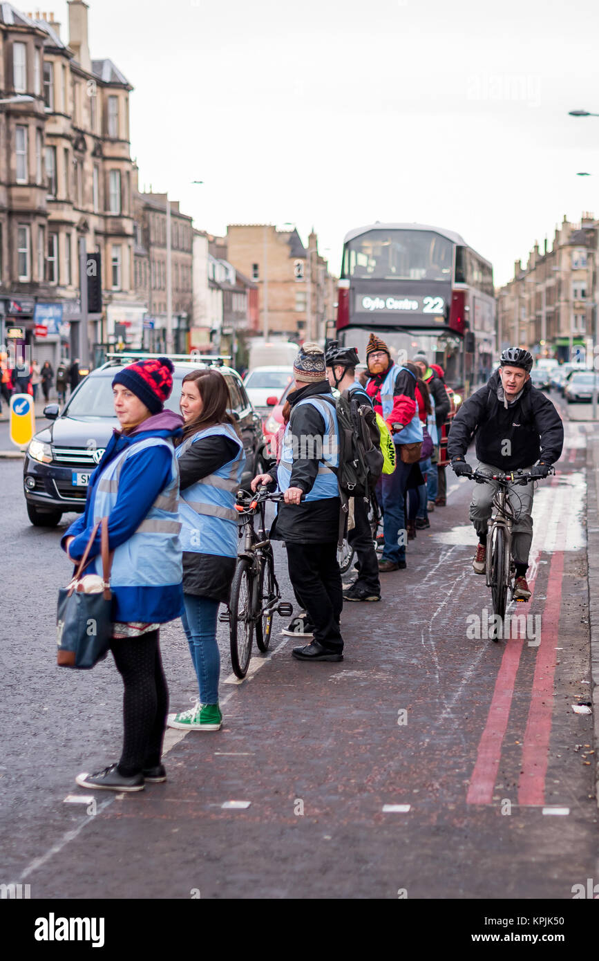 Edinburgh, UK. 16 December 2017. Cyclists form a Human Bollard as a ...
