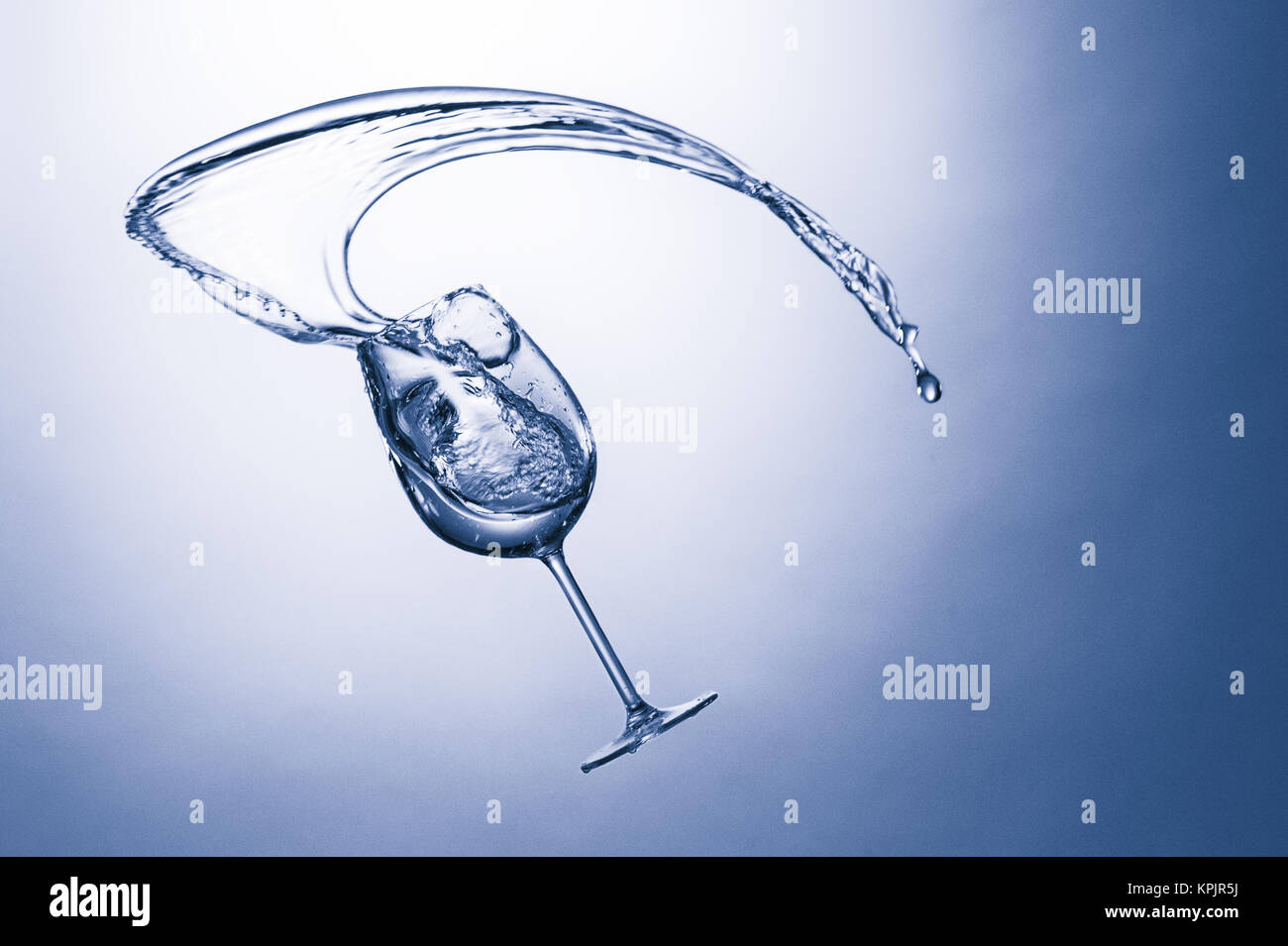 falling glass spilling Stock Photo - Alamy