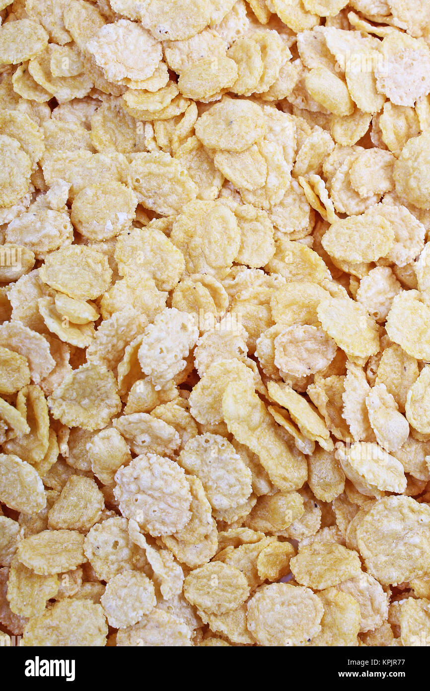 Corn flakes texture closeup pattern as background. Breakfast food photo ...