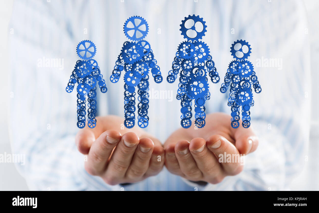 Close of male hands holding with care figures of family Stock Photo - Alamy