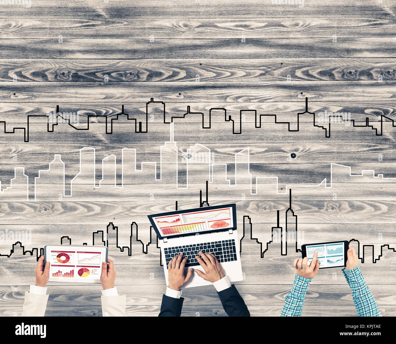 Group of three people with devices in hands working together as symbol ...