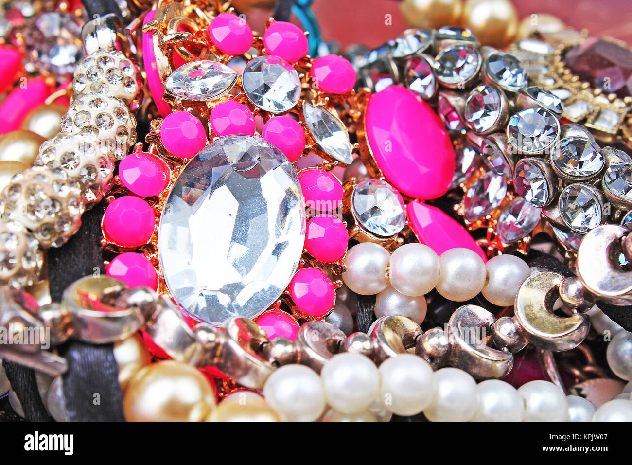 Fashion jewelrys. Fashion jewels as background. Jewelery texture. A lot ...