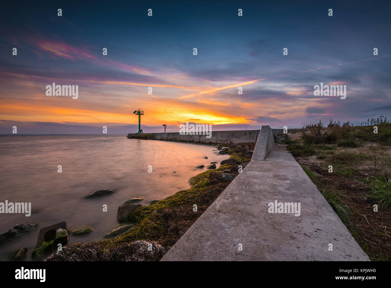 Lighthouse in port of Jastarnia at sunset time. Hel Peninsula. Poland ...
