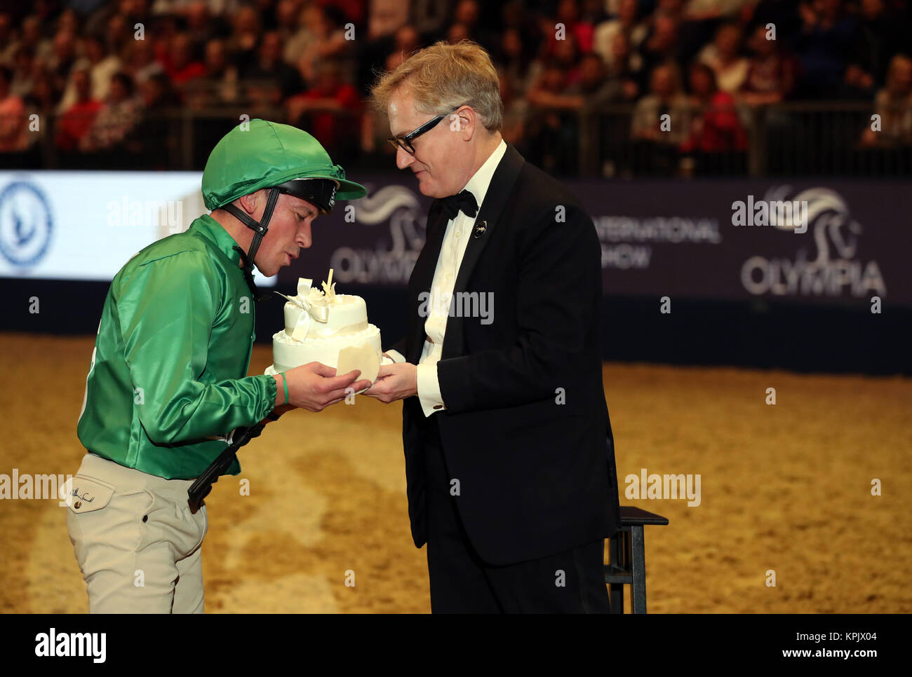 Frankie Dettori gets his birthday cake off Simon Brooks Ward after he ...