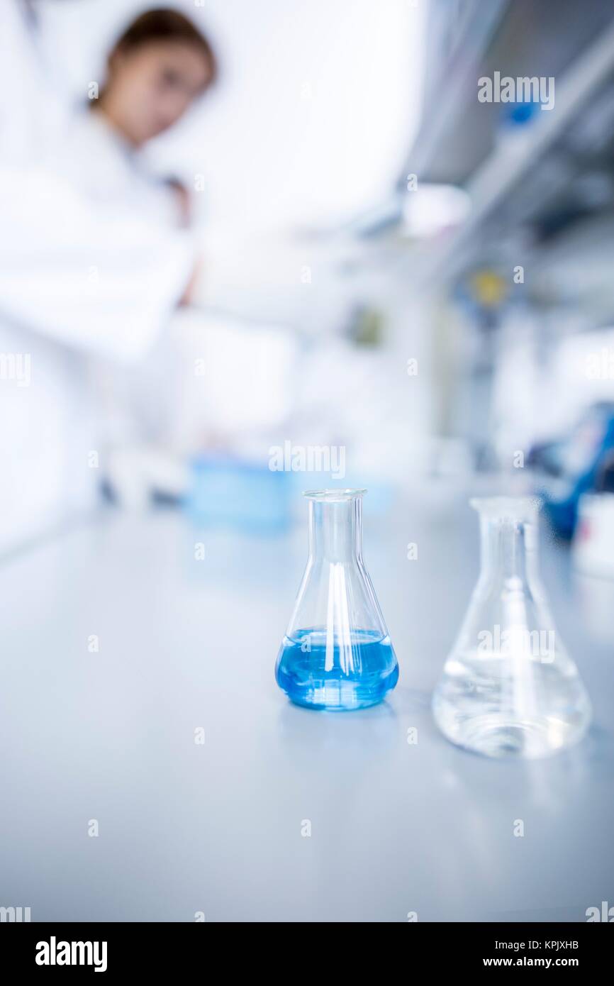 Chemical flasks in laboratory Stock Photo - Alamy