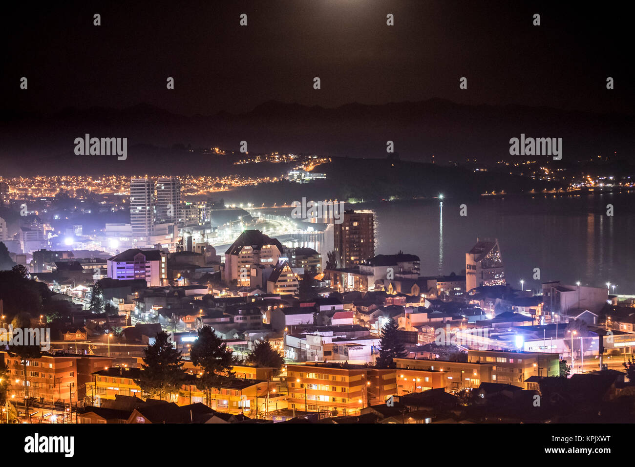 Aerial view night scene of Puerto Montt city, Chile Stock Photo - Alamy