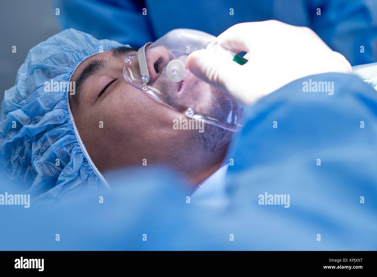 Male patient on operating table with gas mask Stock Photo - Alamy