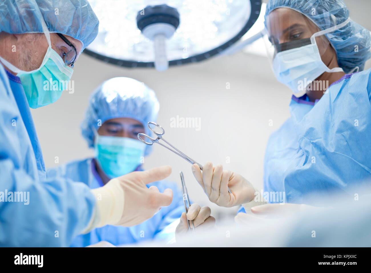 Male passing scissors female hi-res stock photography and images - Alamy