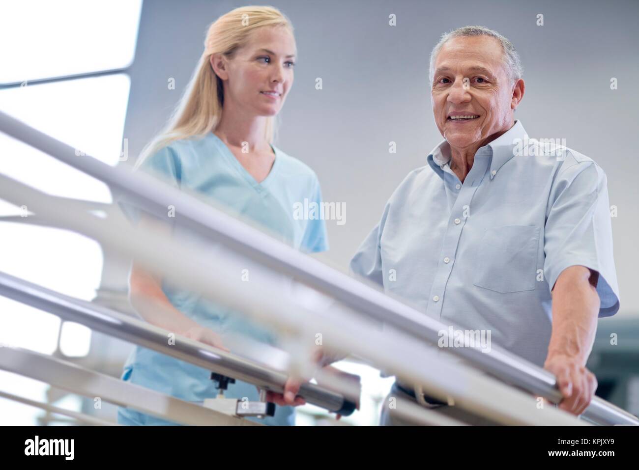 Senior woman using parallel hi-res stock photography and images - Alamy