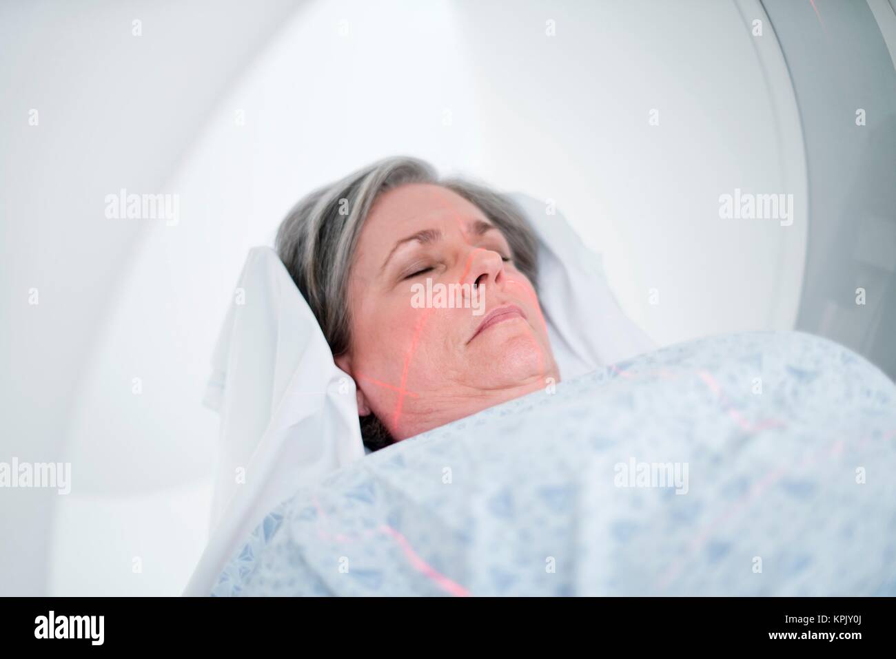 Female patient in MRI scanner Stock Photo - Alamy