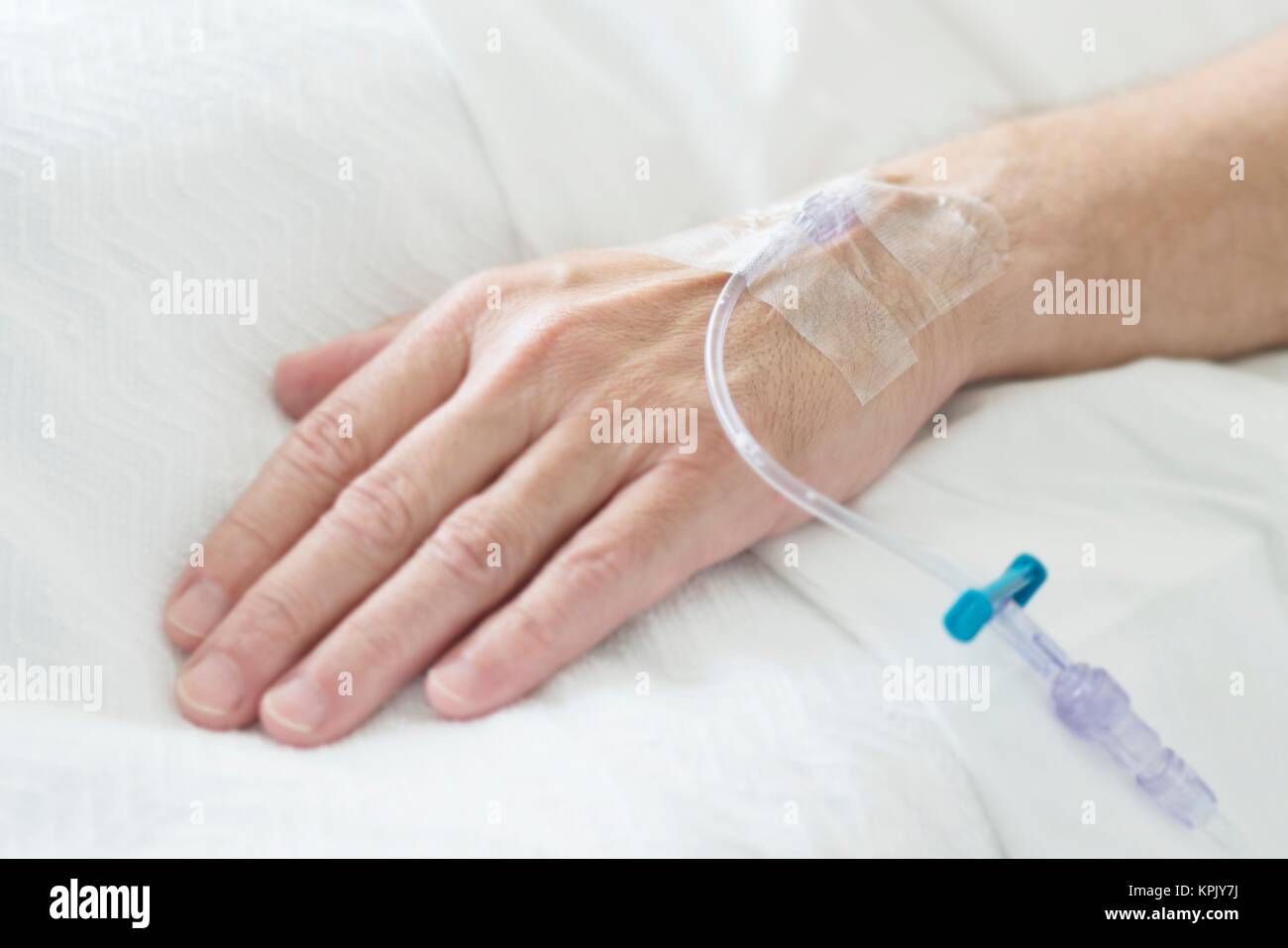 Patient's hand with cannula, close up Stock Photo - Alamy