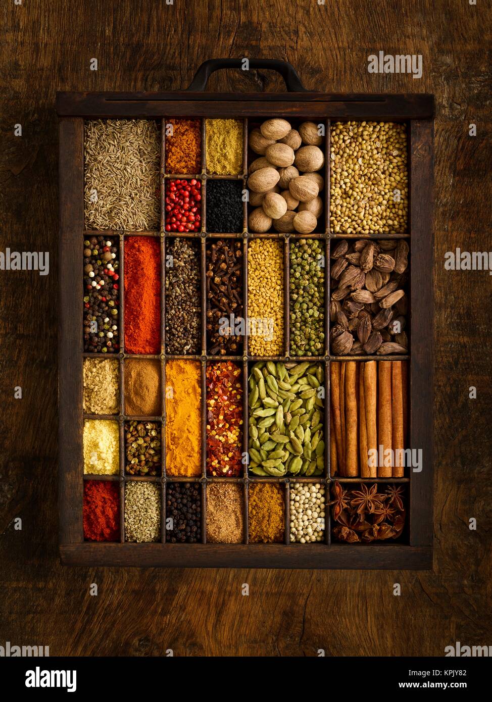 Selection of dried spices in drawer Stock Photo - Alamy