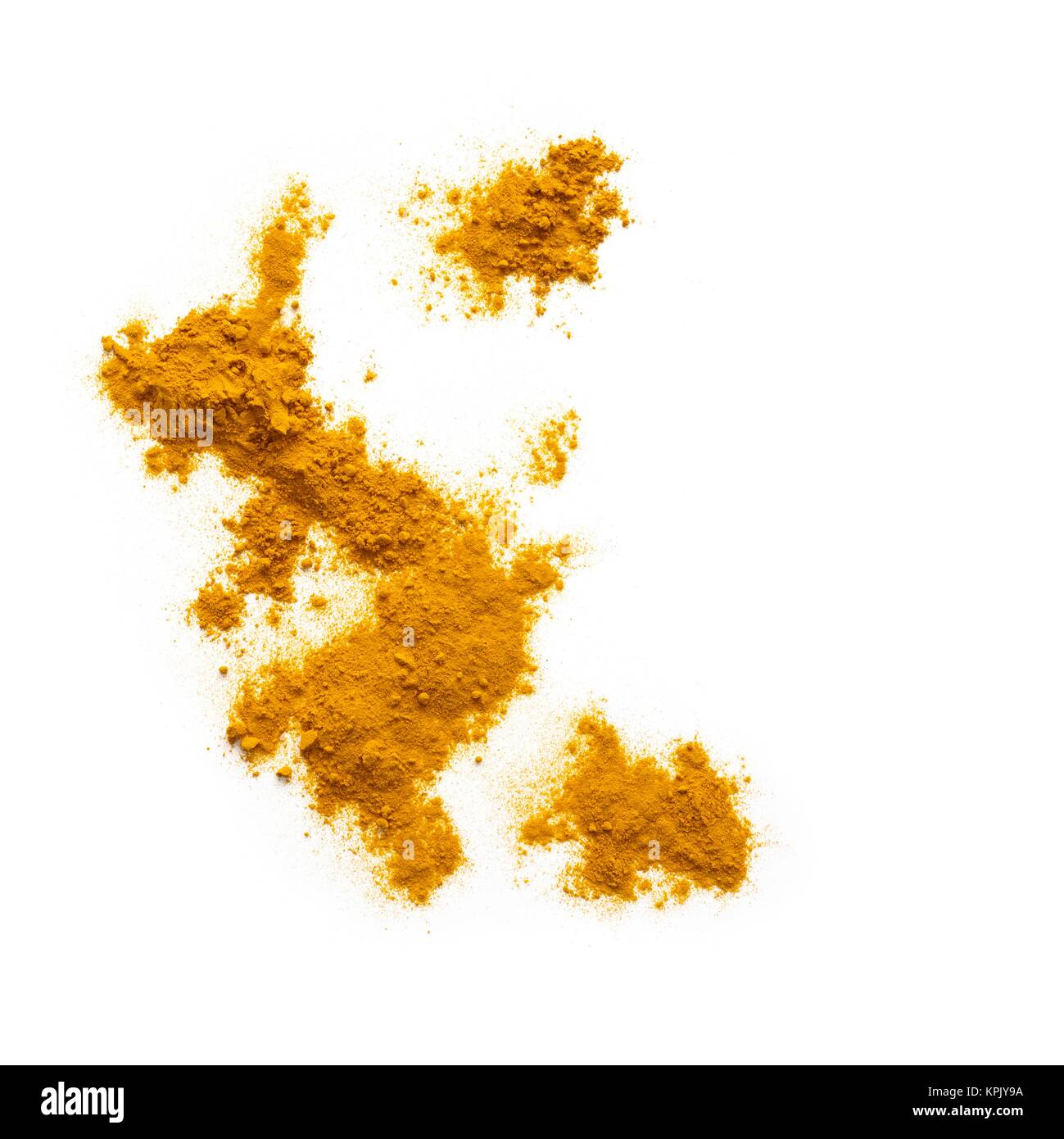 Turmeric powder against a white background Stock Photo - Alamy