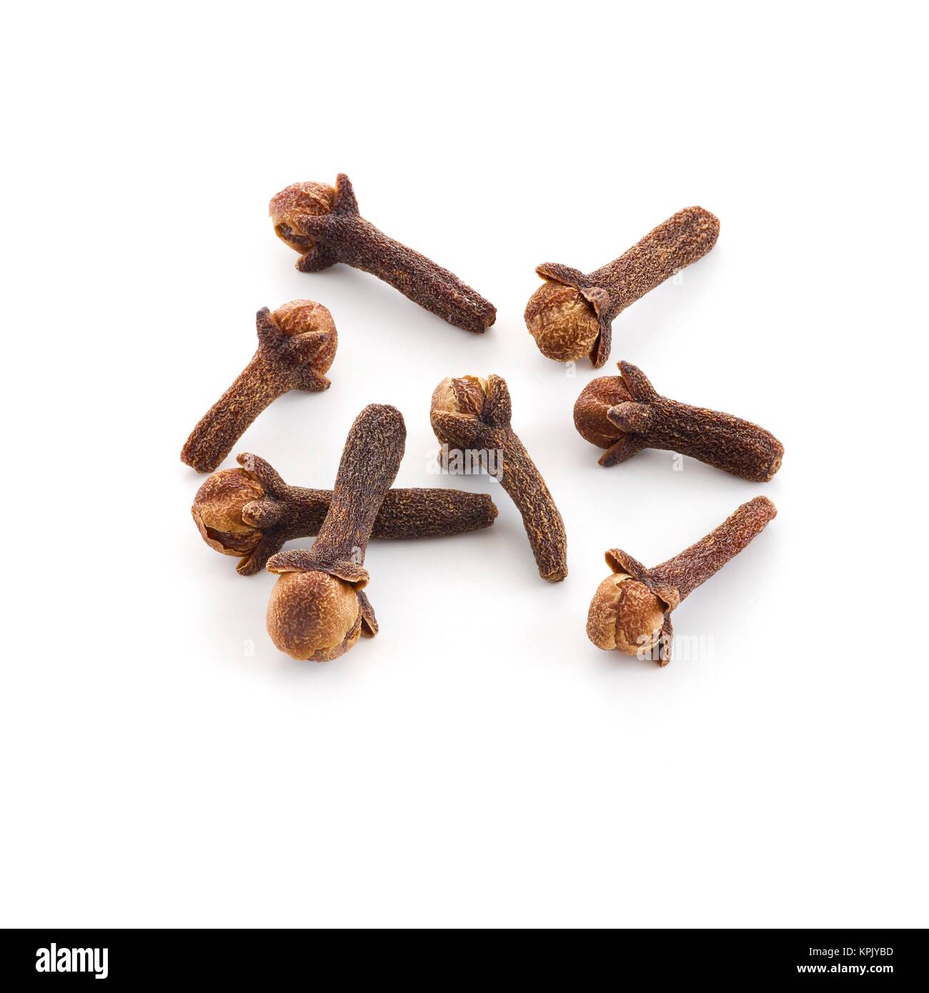 Dried cloves against a white background Stock Photo - Alamy