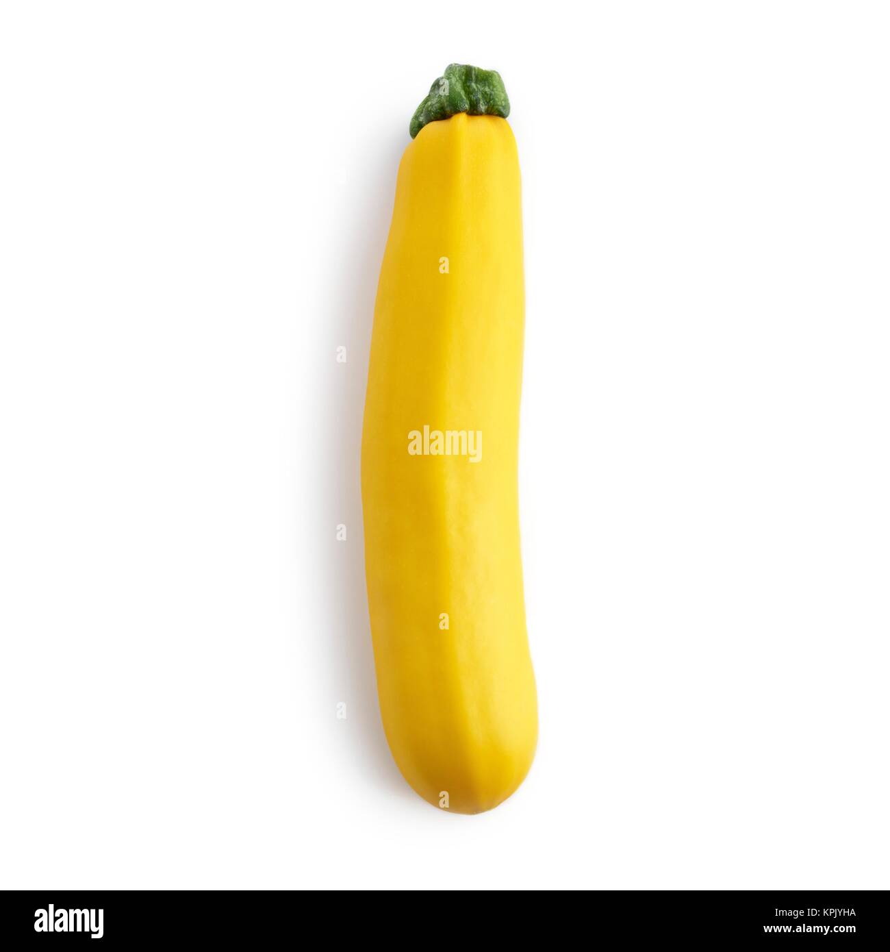 Yellow courgette against a white background Stock Photo - Alamy